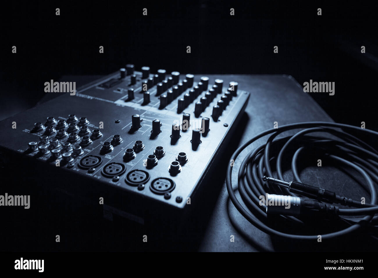 Close up shot of a mixer desk with many buttons and cables Stock Photo ...