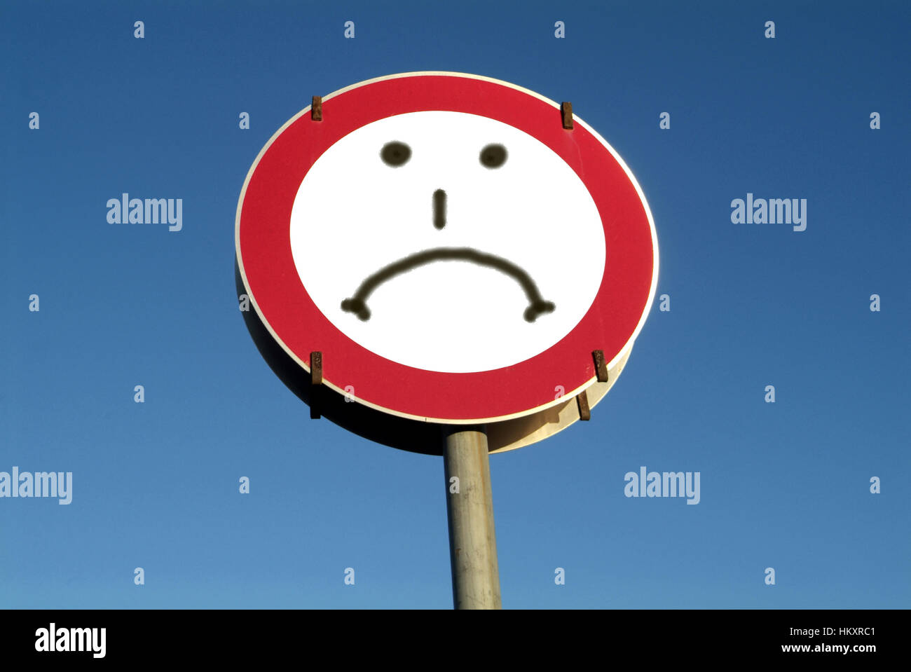 Symbolic for sad traffic sign Stock Photo - Alamy