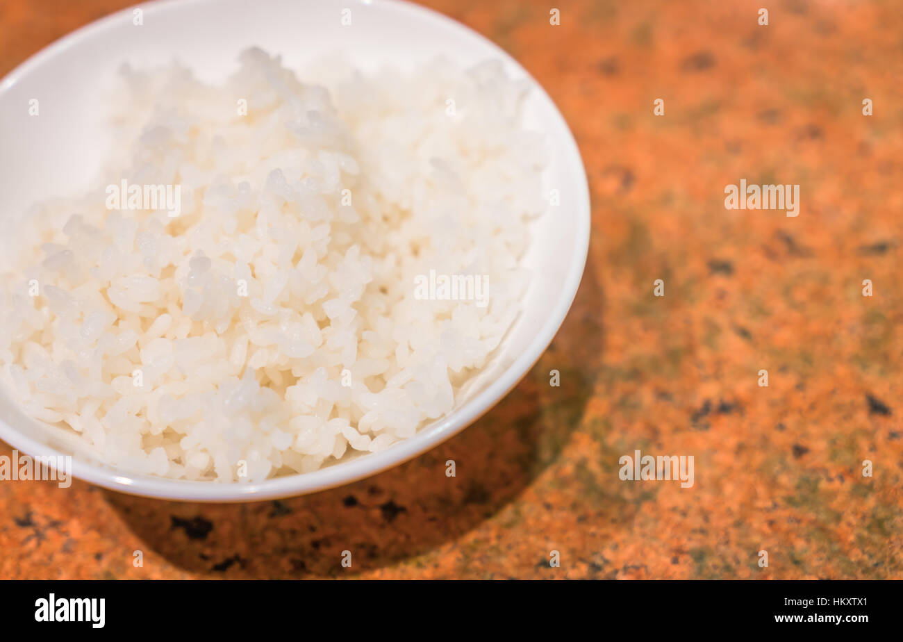 Rice in a bowl Stock Photo - Alamy