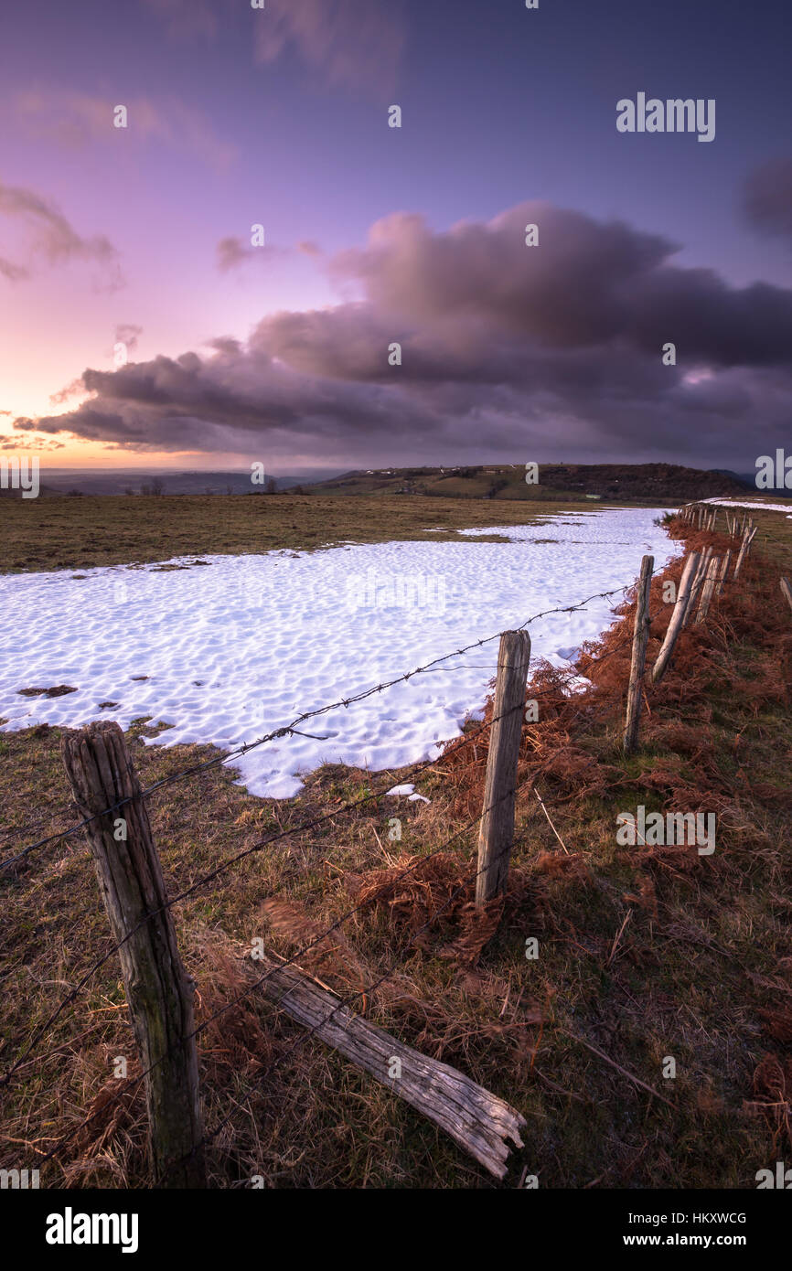Wintery scene from Auvergne France fence and snowy field Stock Photo ...