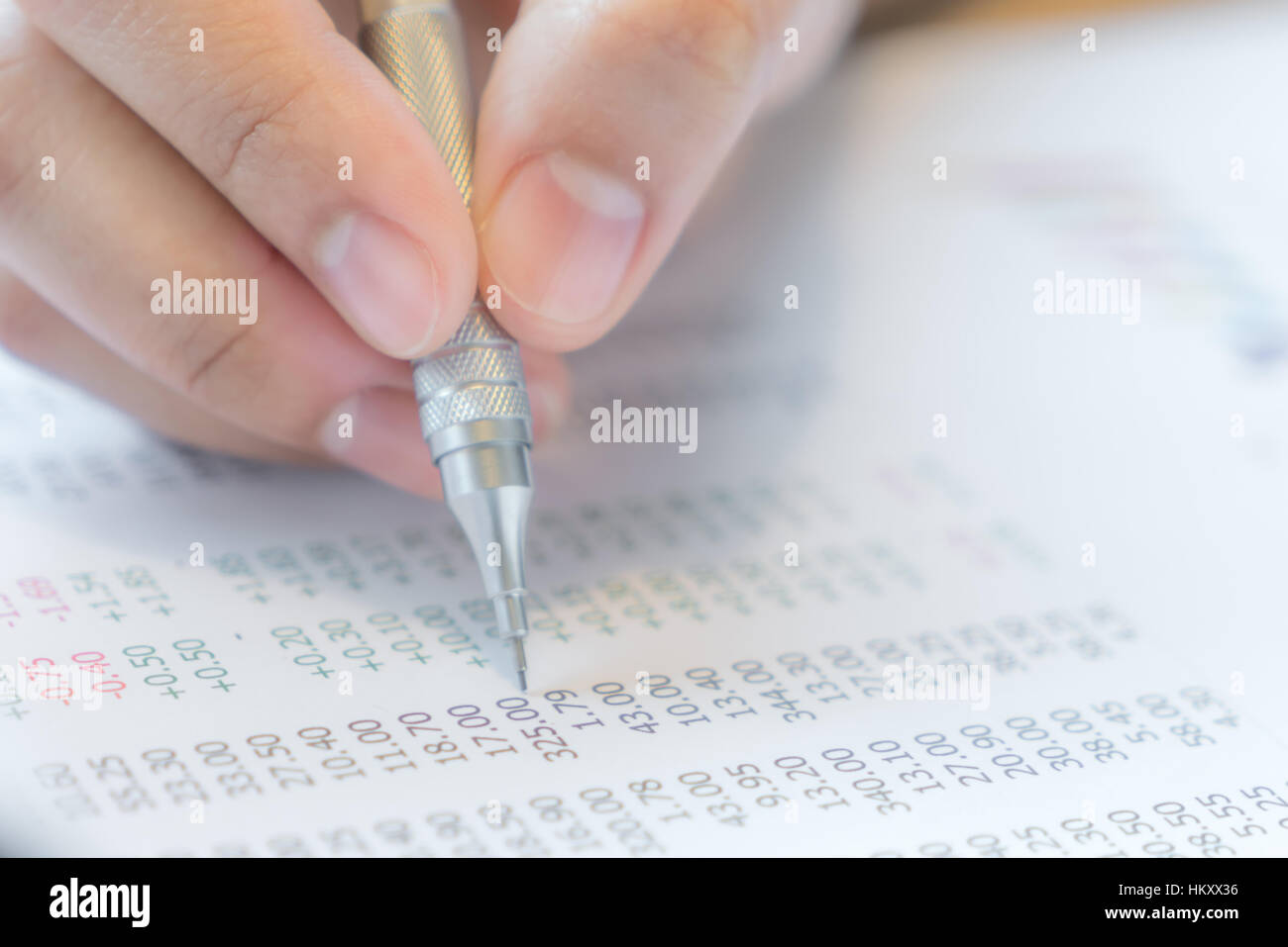 Hand write on Various financial charts on the table Stock Photo - Alamy