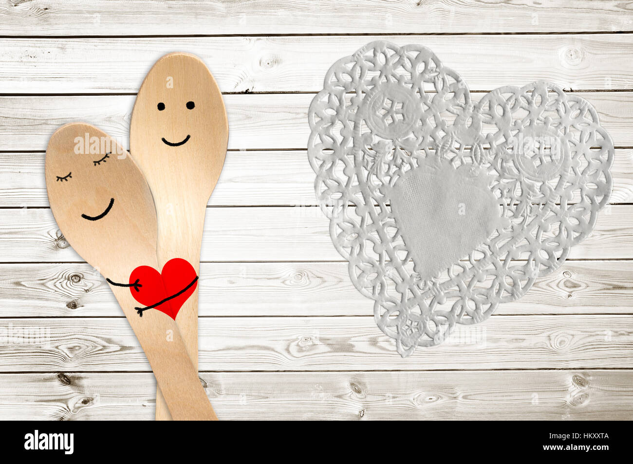 Happy couple hug concept, smiley painted on spoons, valentines day ...