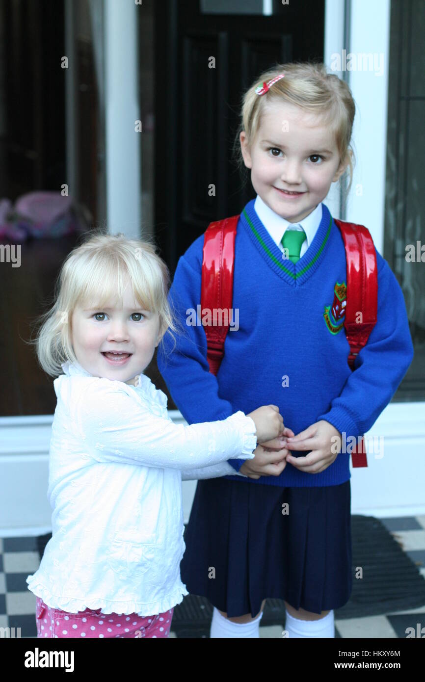 Little girl , child wearing her school uniform on her first day of ...