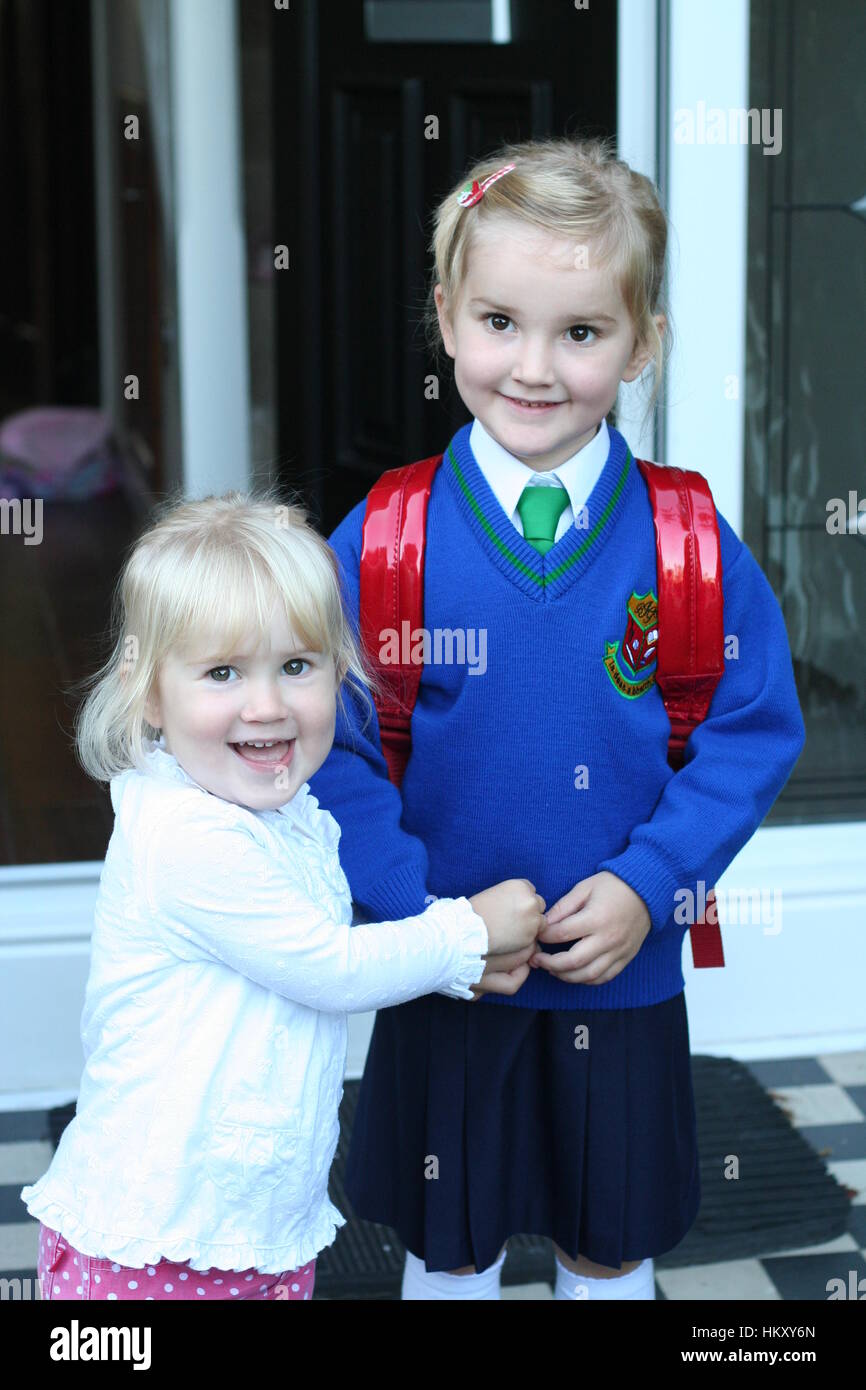 Little girl , child wearing her school uniform on her first day of ...