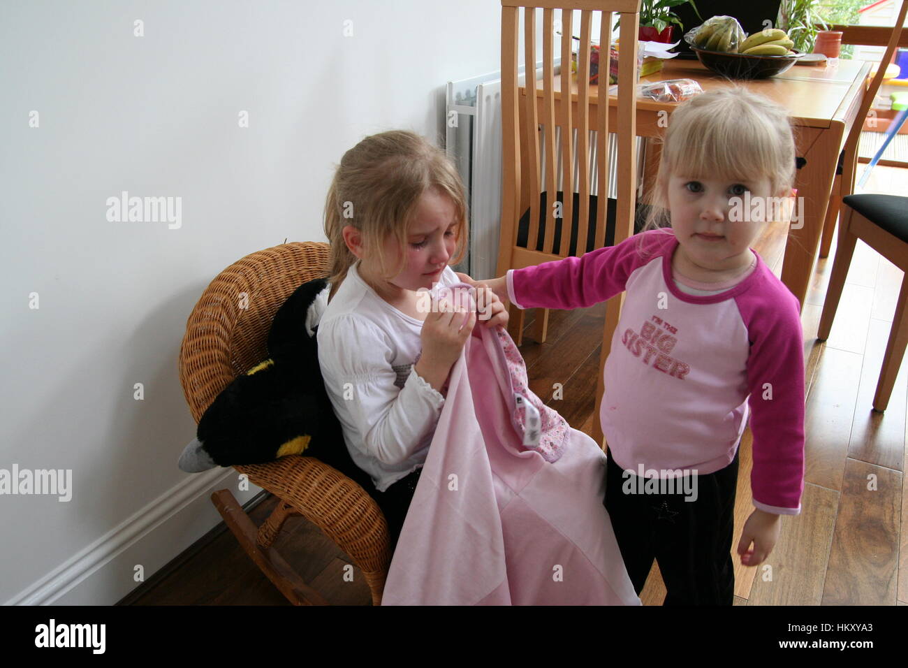 Sibling comforting hi-res stock photography and images - Alamy