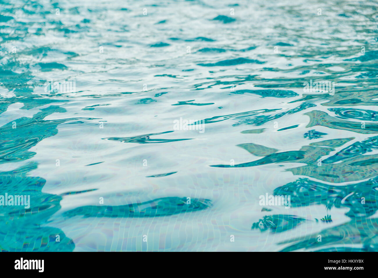 Blue swimming pool rippled water Stock Photo - Alamy