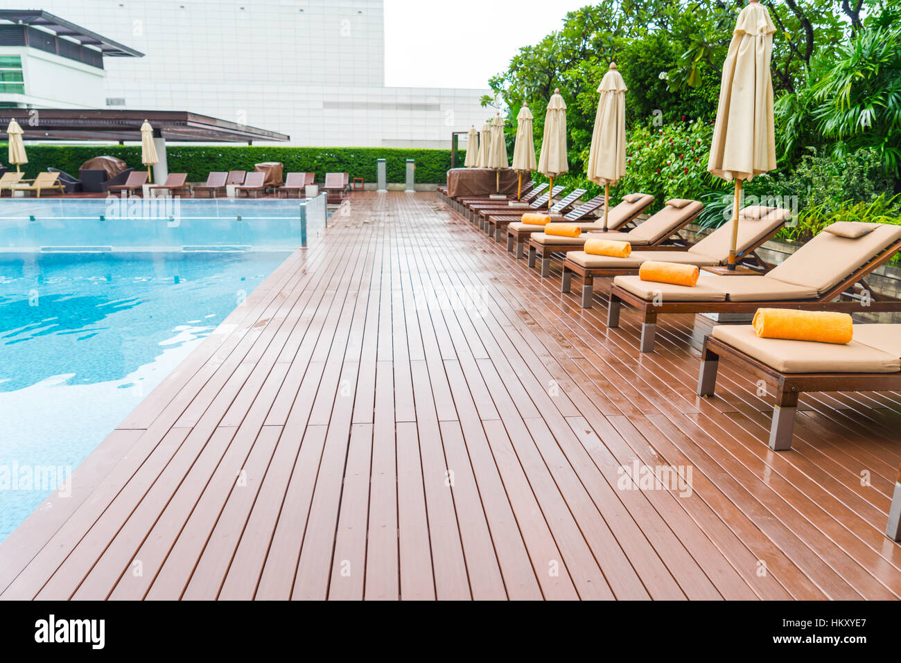 Swimming pool with relaxing seats Stock Photo - Alamy