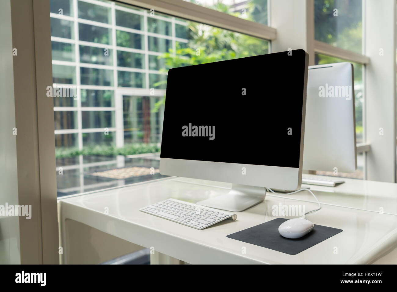 Computer on table in office, Workspace Stock Photo - Alamy