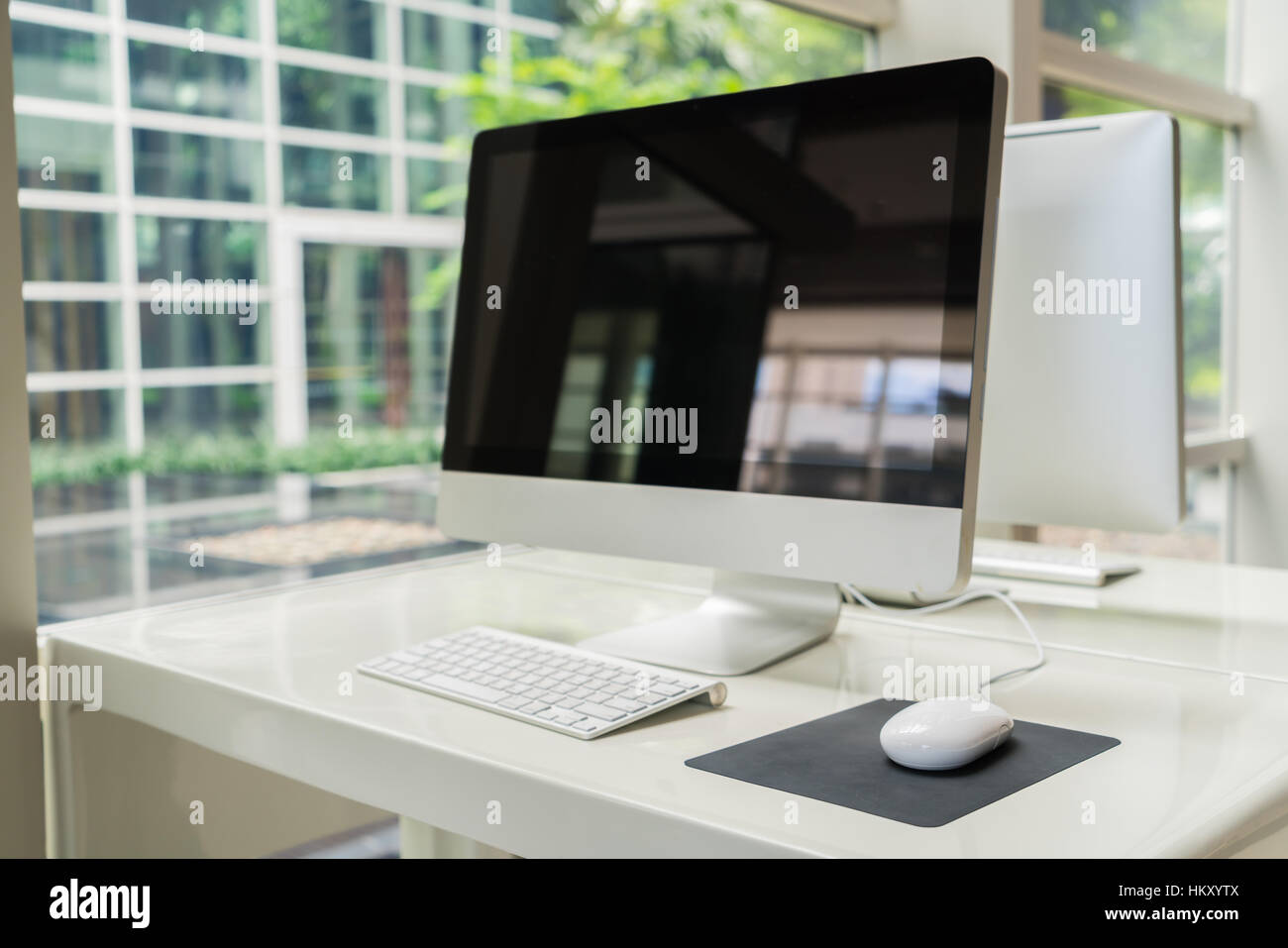 Computer on table in office, Workspace Stock Photo - Alamy