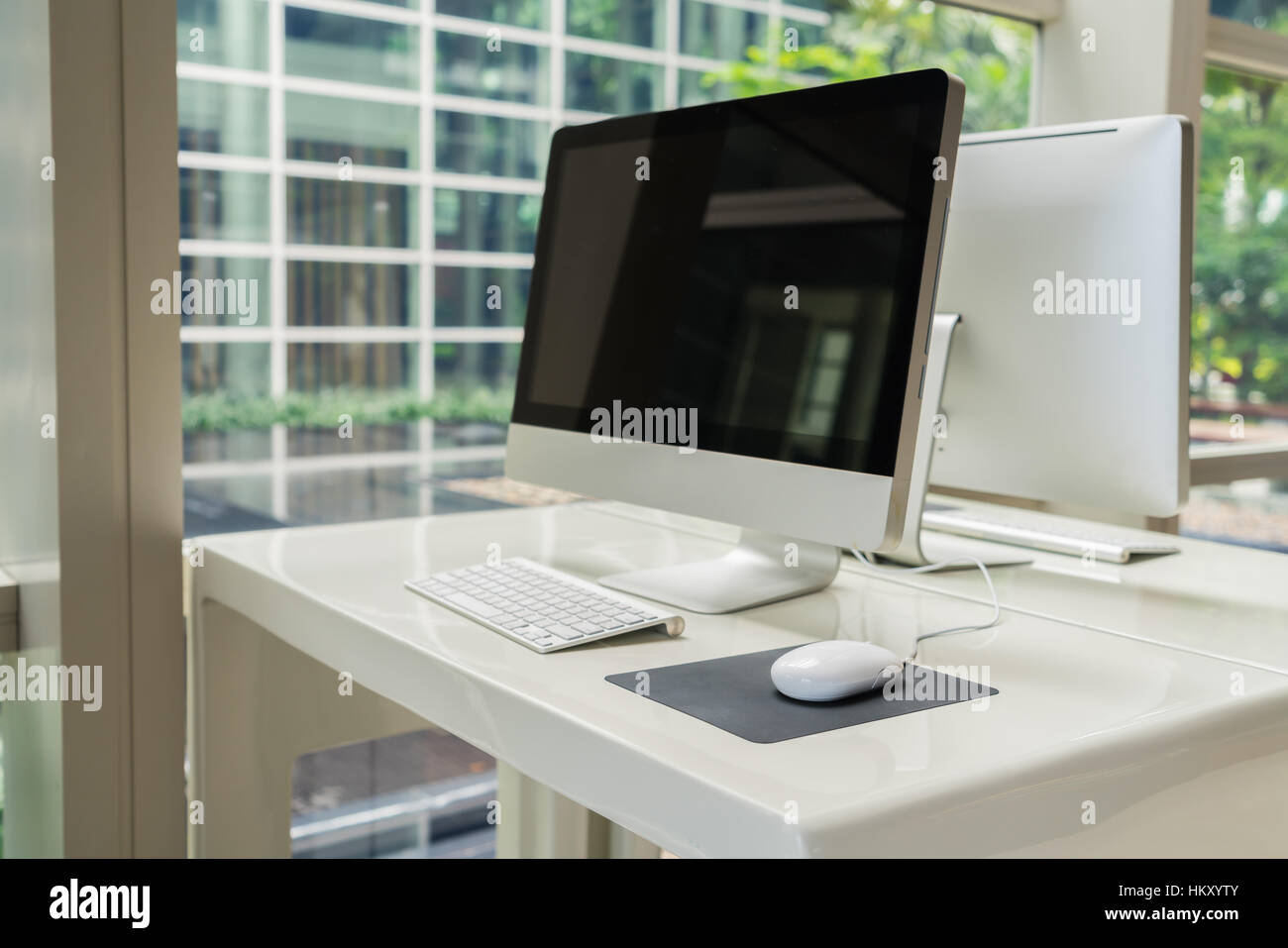 Computer on table in office, Workspace Stock Photo - Alamy