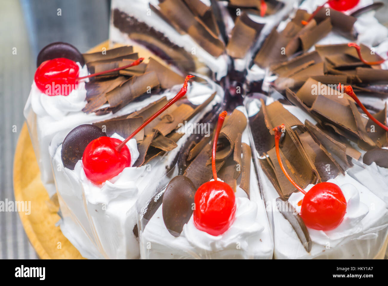 Chocolate cake with red cherries Stock Photo - Alamy