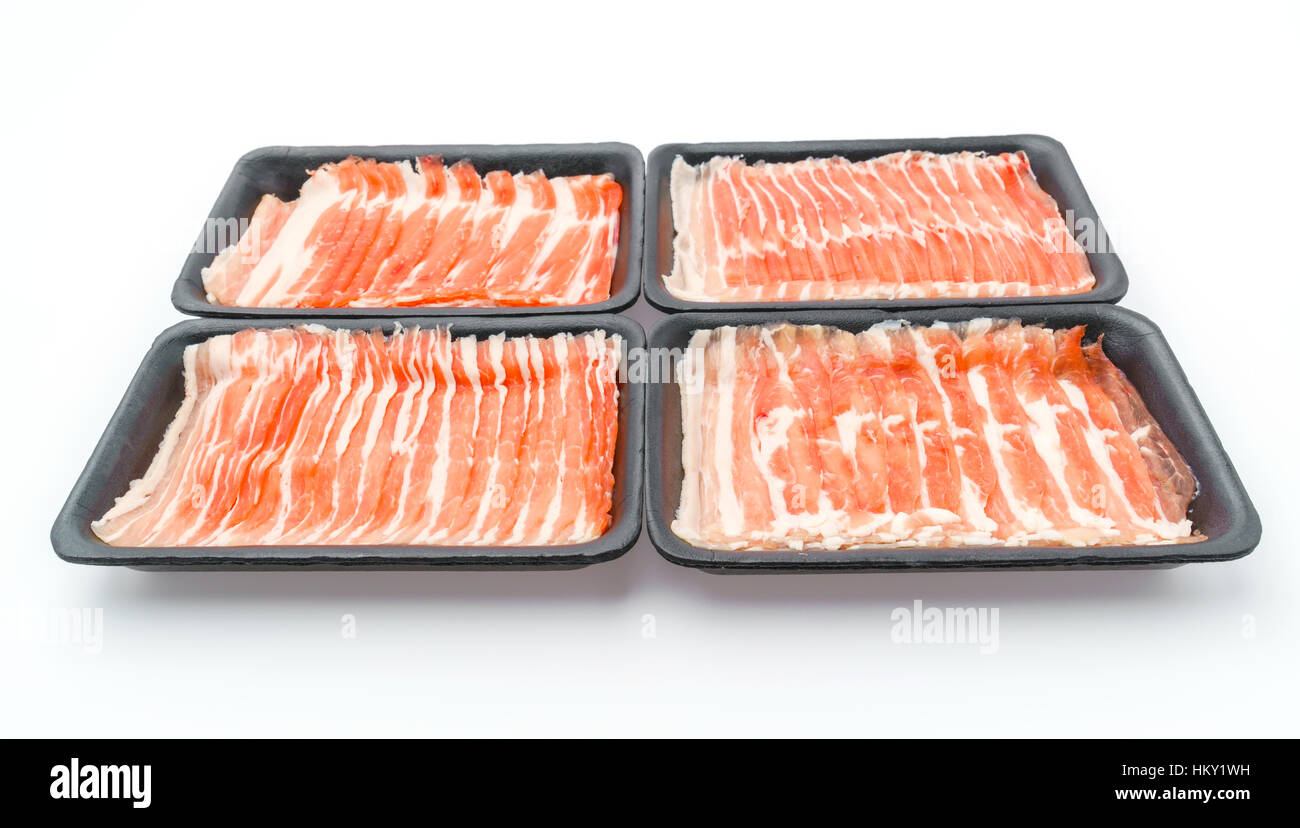 Slide of raw pork on white background Stock Photo - Alamy