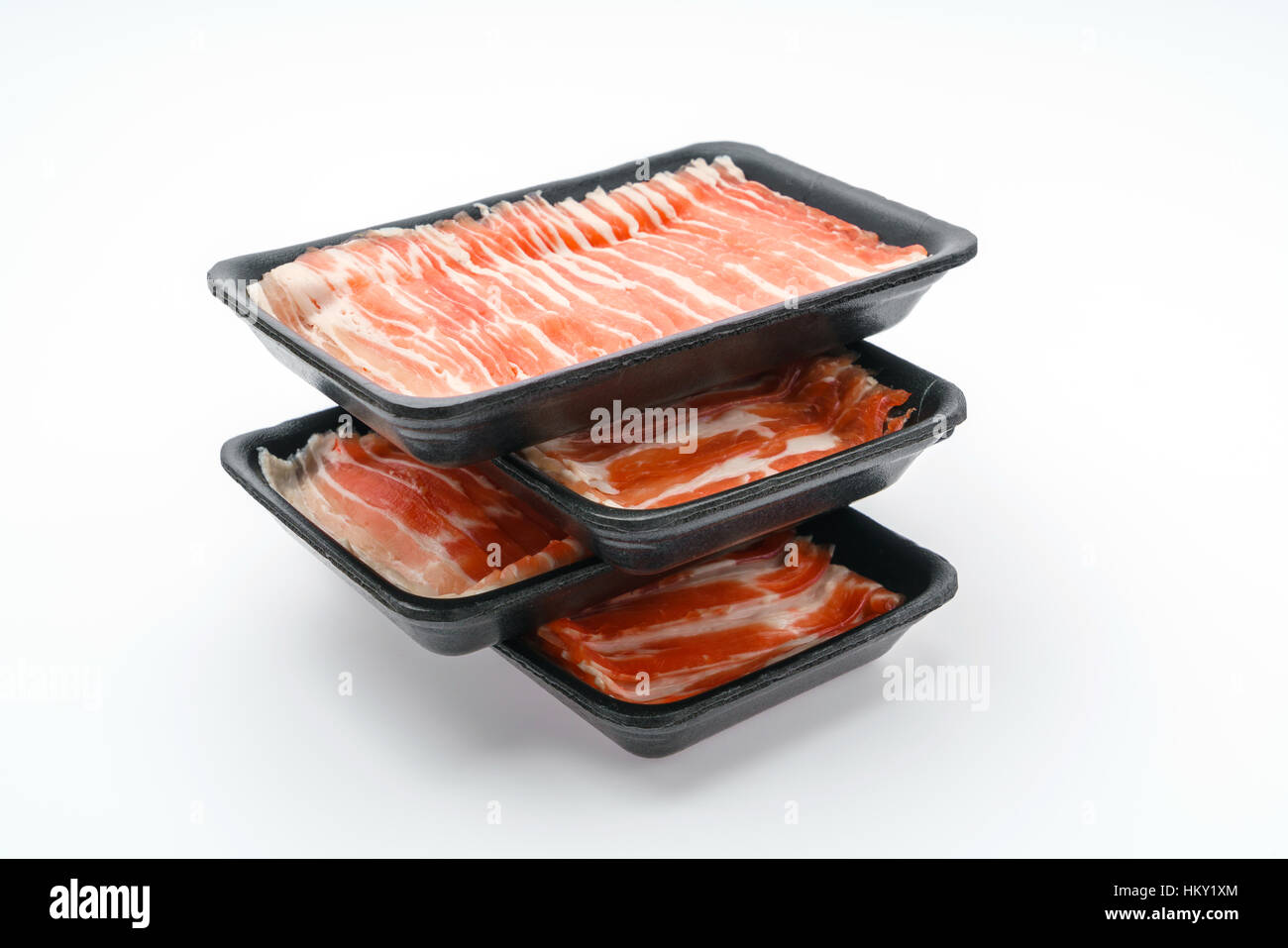 Slide of raw pork on white background Stock Photo - Alamy
