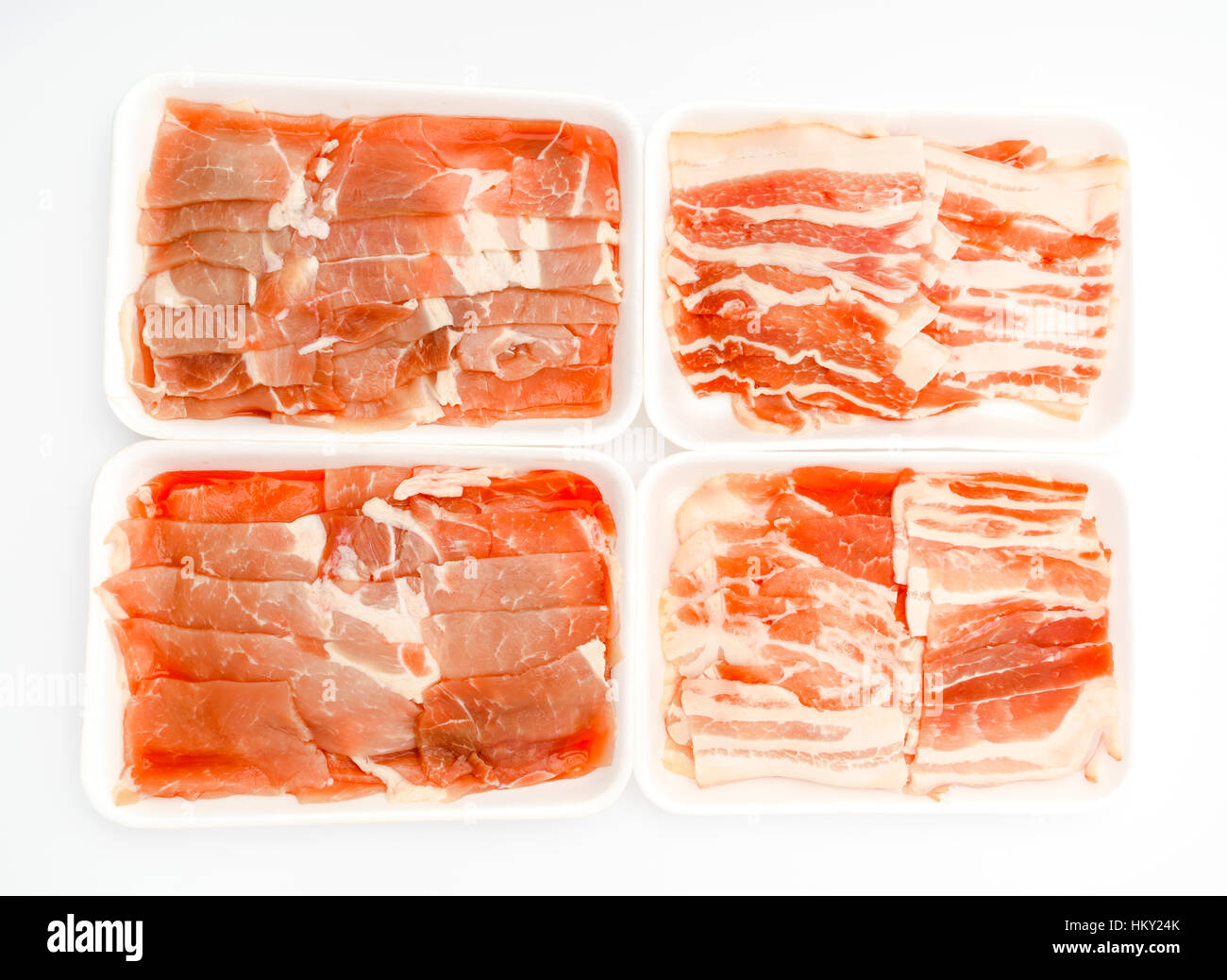 Slide of raw pork on white background Stock Photo - Alamy
