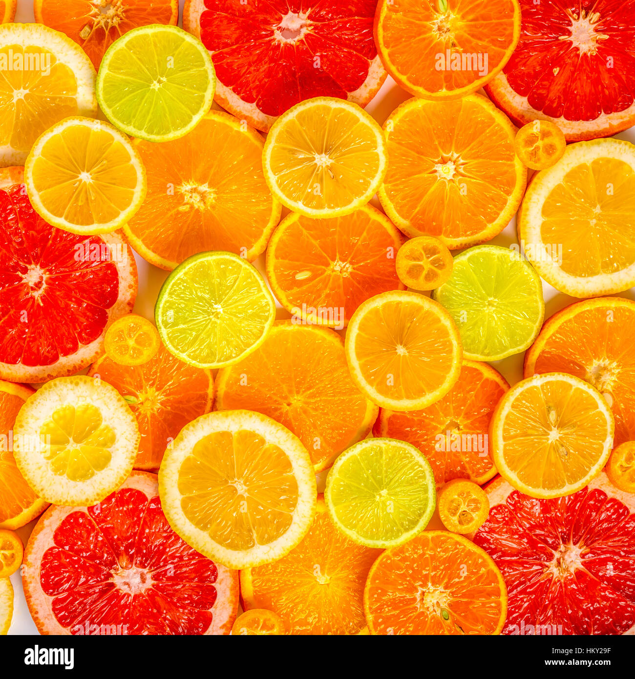 beautiful fresh sliced mixed citrus fruits like background, concept of ...