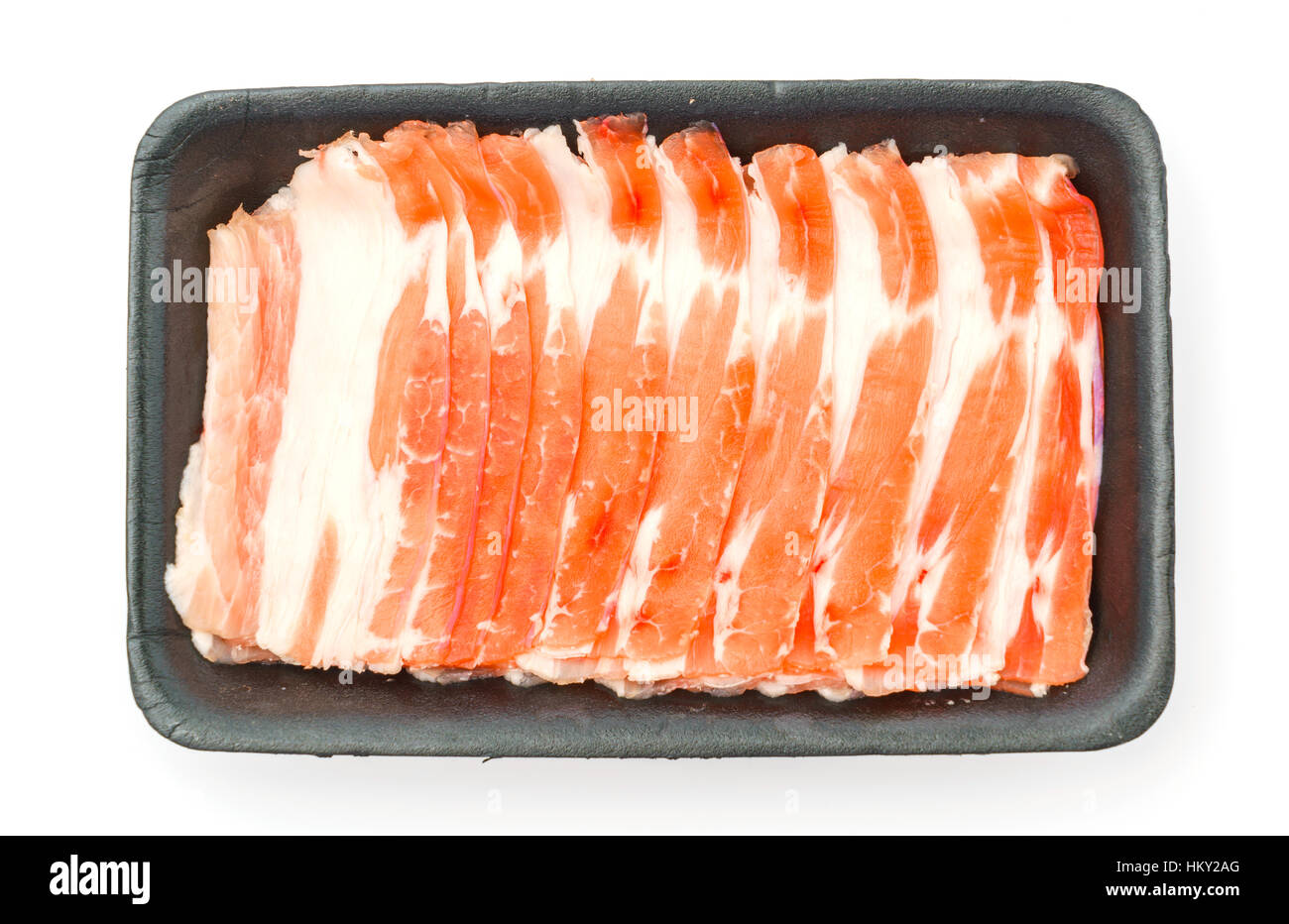 Slide of raw pork on white background Stock Photo - Alamy
