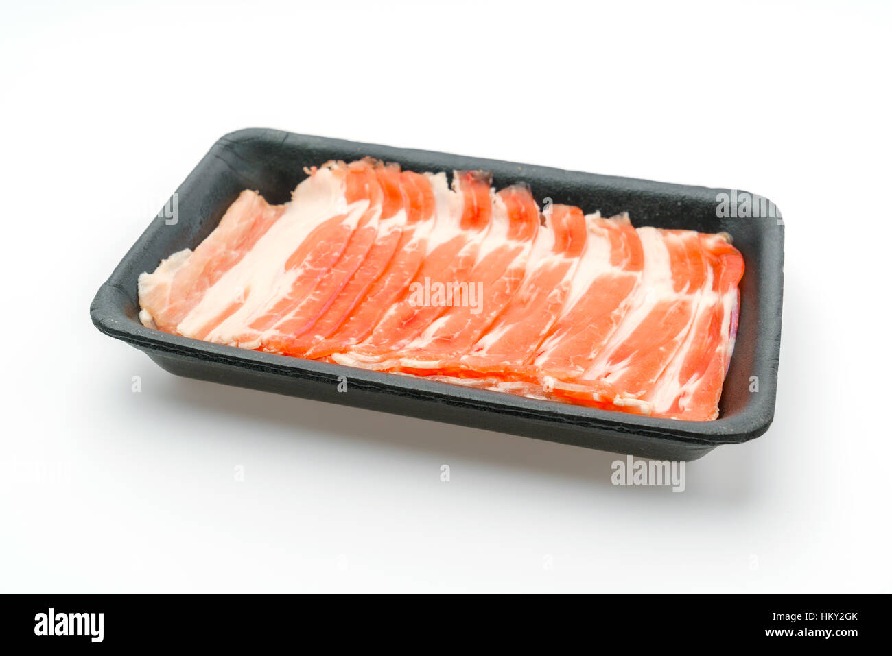 Slide of raw pork on white background Stock Photo - Alamy