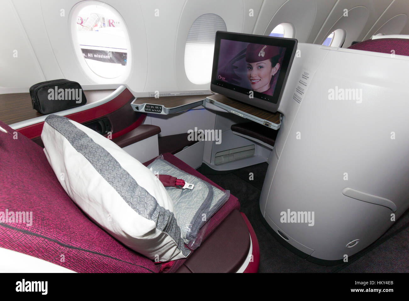 PARIS - JUN 18, 2015: First Class seat in a Qatar Airways Airbus A350 ...
