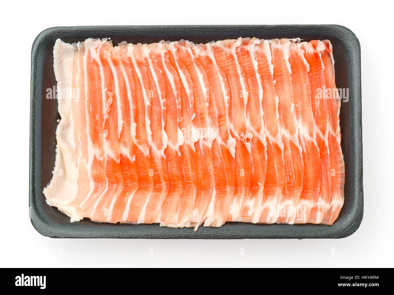 Slide of raw pork on white background Stock Photo - Alamy