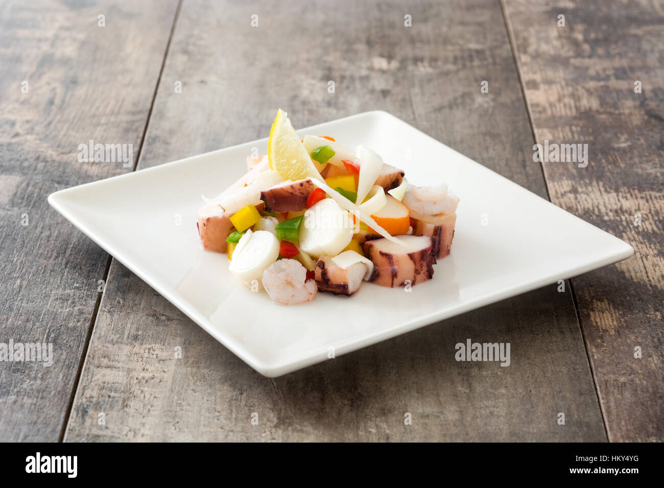 Traditional seafood ceviche from Peru on wooden background Stock Photo ...
