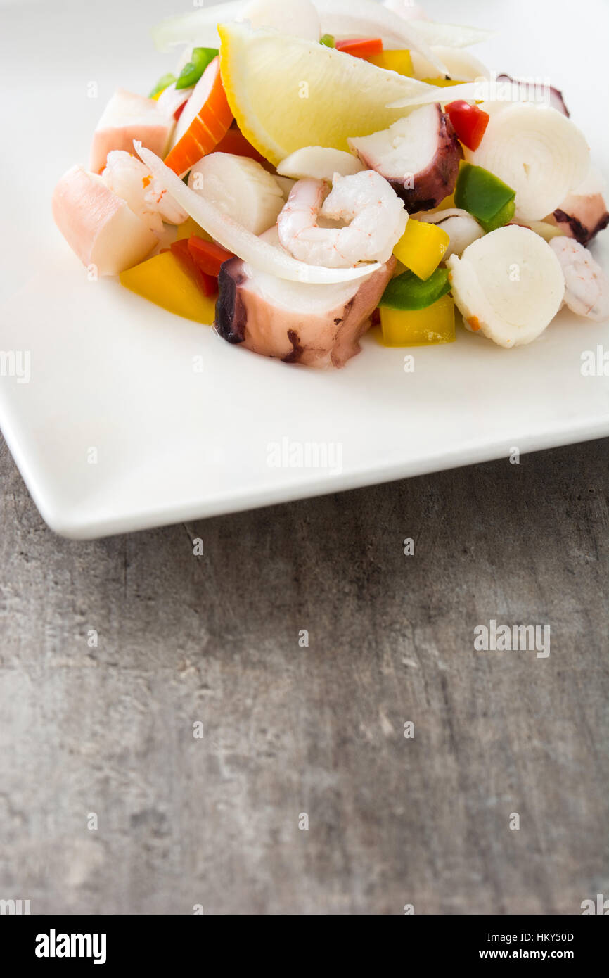 Traditional seafood ceviche from Peru on wooden background Stock Photo ...