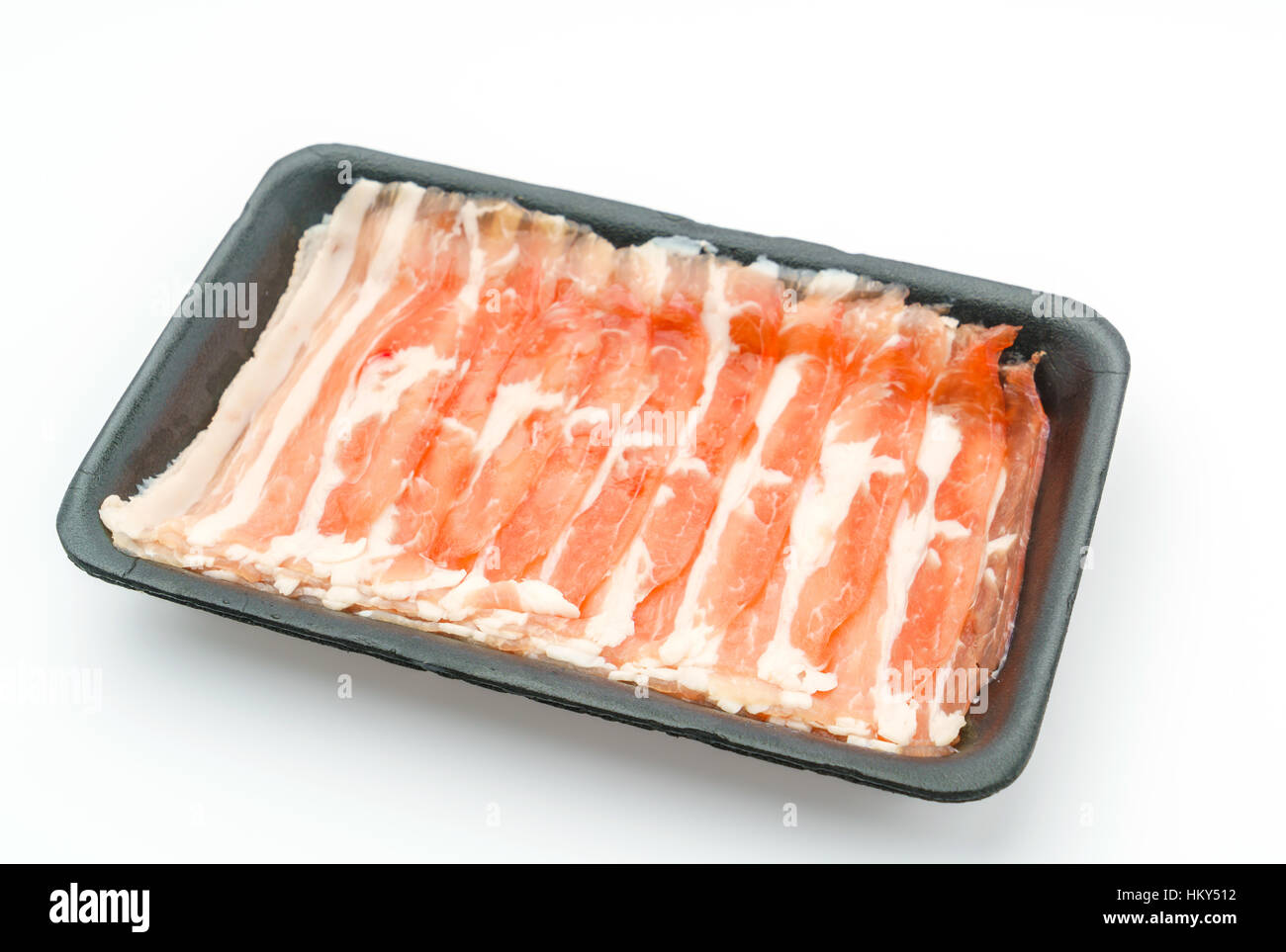 Slide of raw pork on white background Stock Photo - Alamy