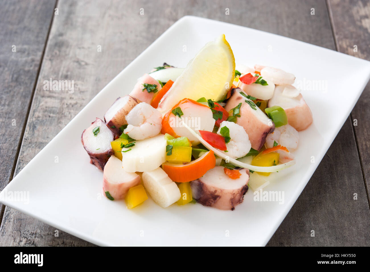 Traditional seafood ceviche from Peru on wooden background Stock Photo ...
