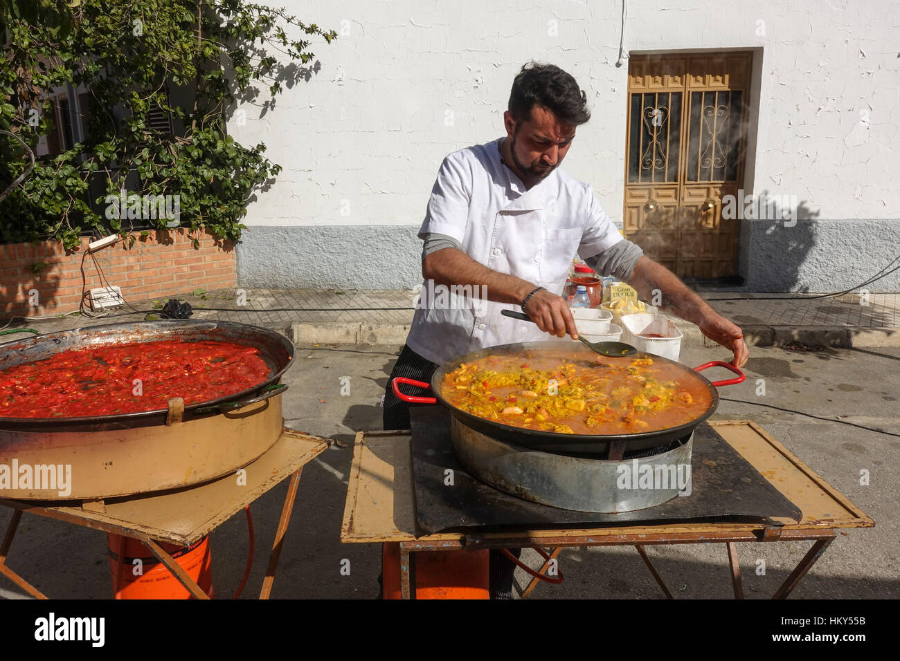 Traditional spanish Paella dish being prepared on Spanish Market, Guaro ...