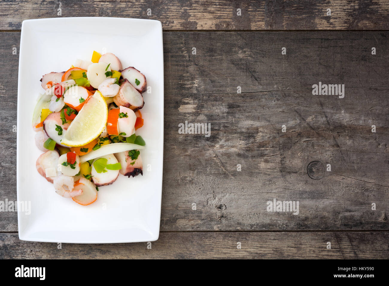 Traditional seafood ceviche from Peru on wooden background Stock Photo ...