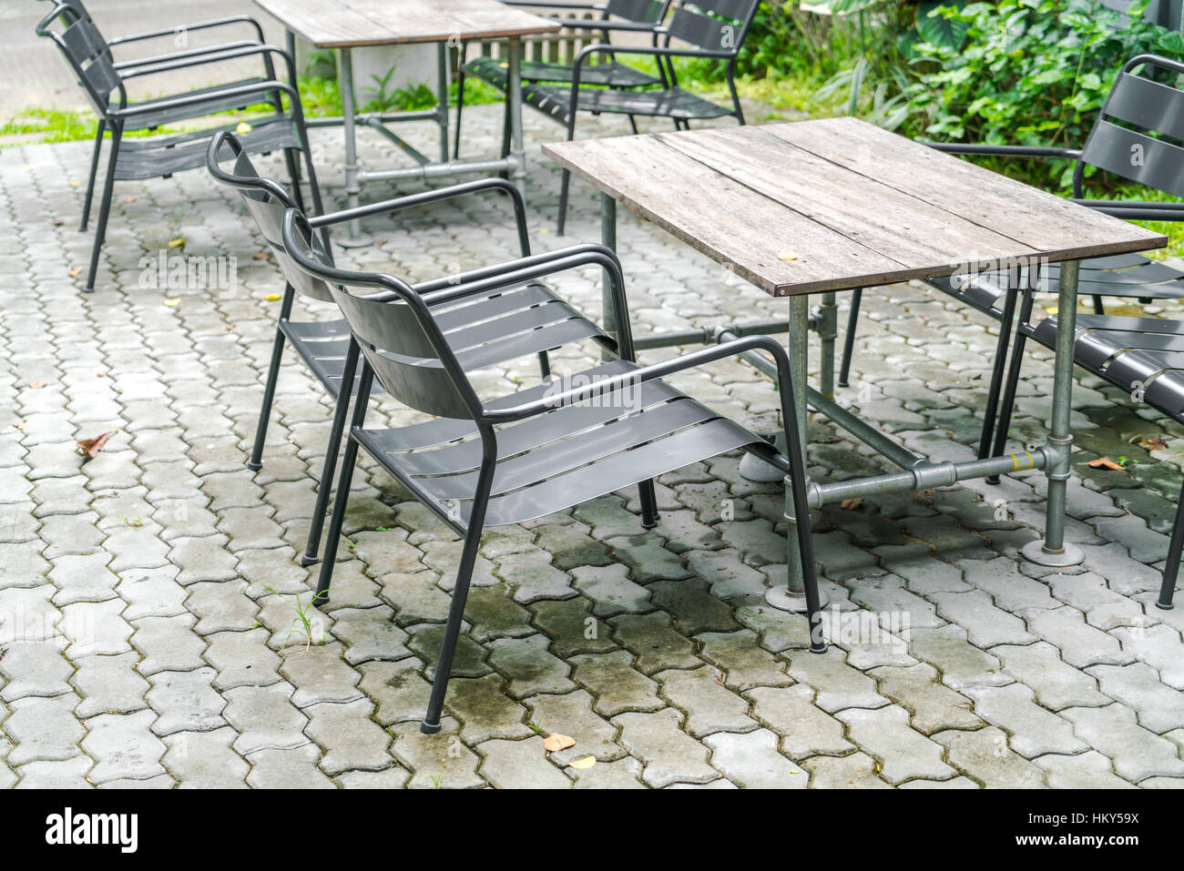 Tables and chairs in restaurant Stock Photo - Alamy