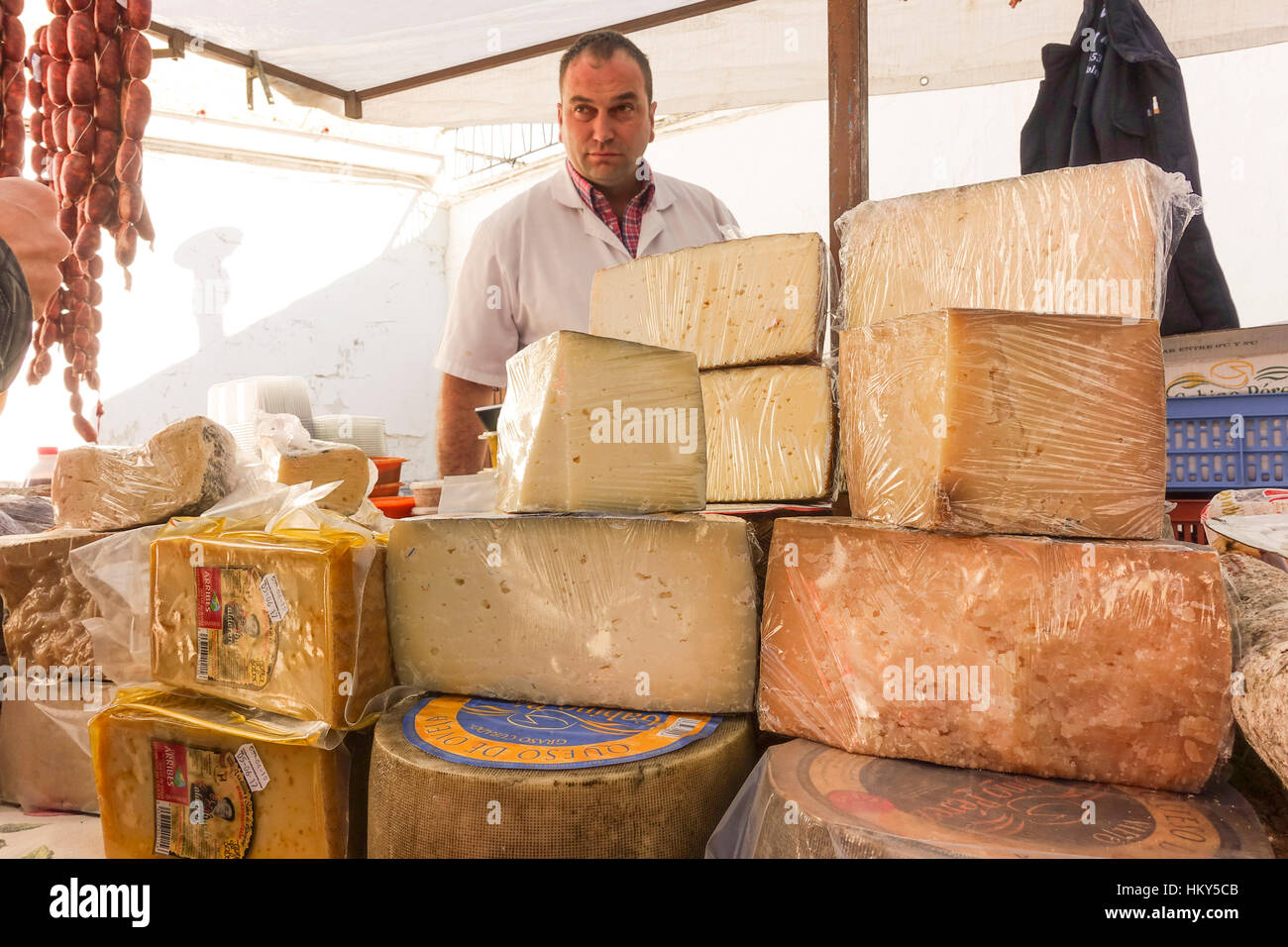 Vendor on market in Cheese stall, Andalusia, Spain Stock Photo - Alamy