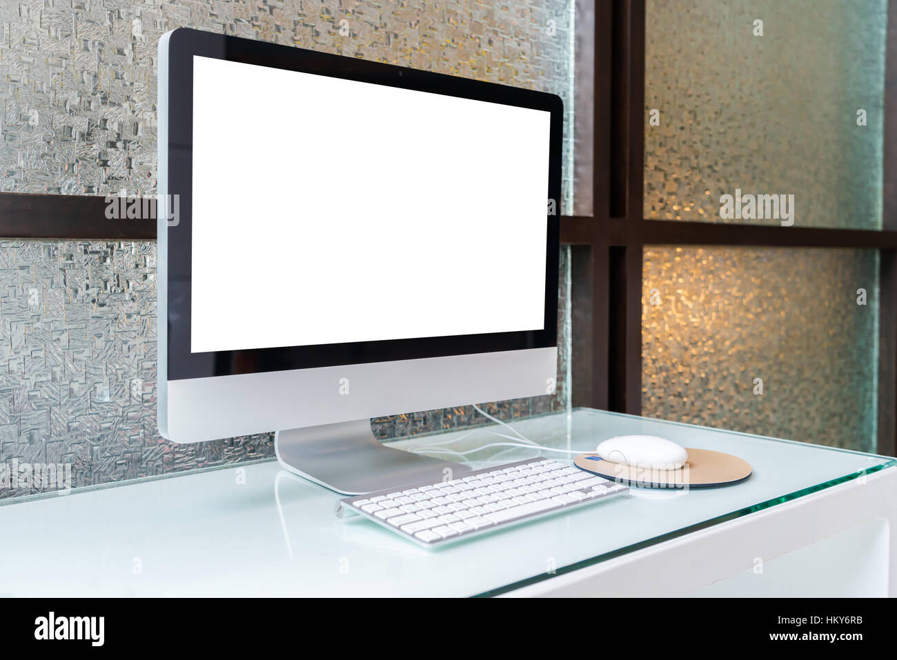 Computer on table in office Stock Photo - Alamy
