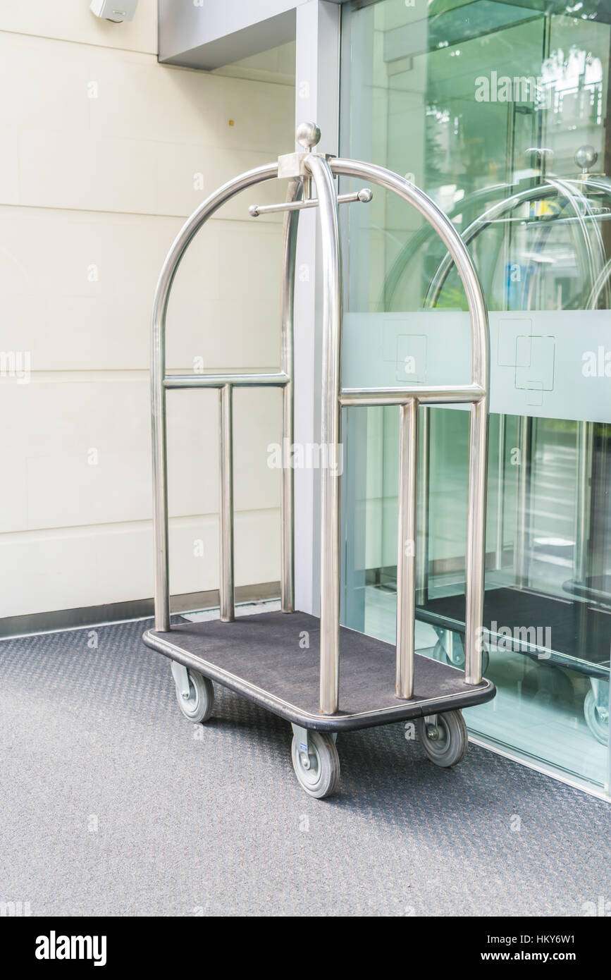 Hotel luxury trolley for transfer suitcase Stock Photo - Alamy