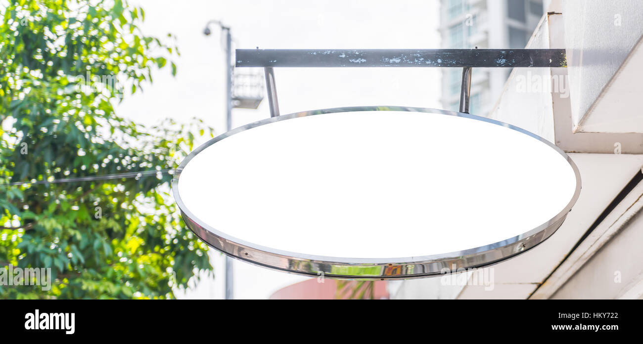 Round shop sign outdoor Stock Photo - Alamy