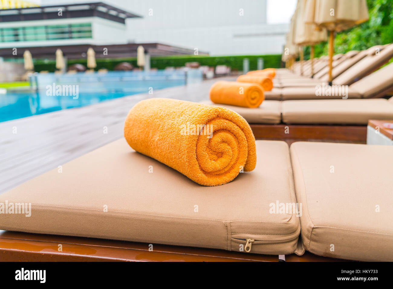 Swimming pool with relaxing seats Stock Photo - Alamy