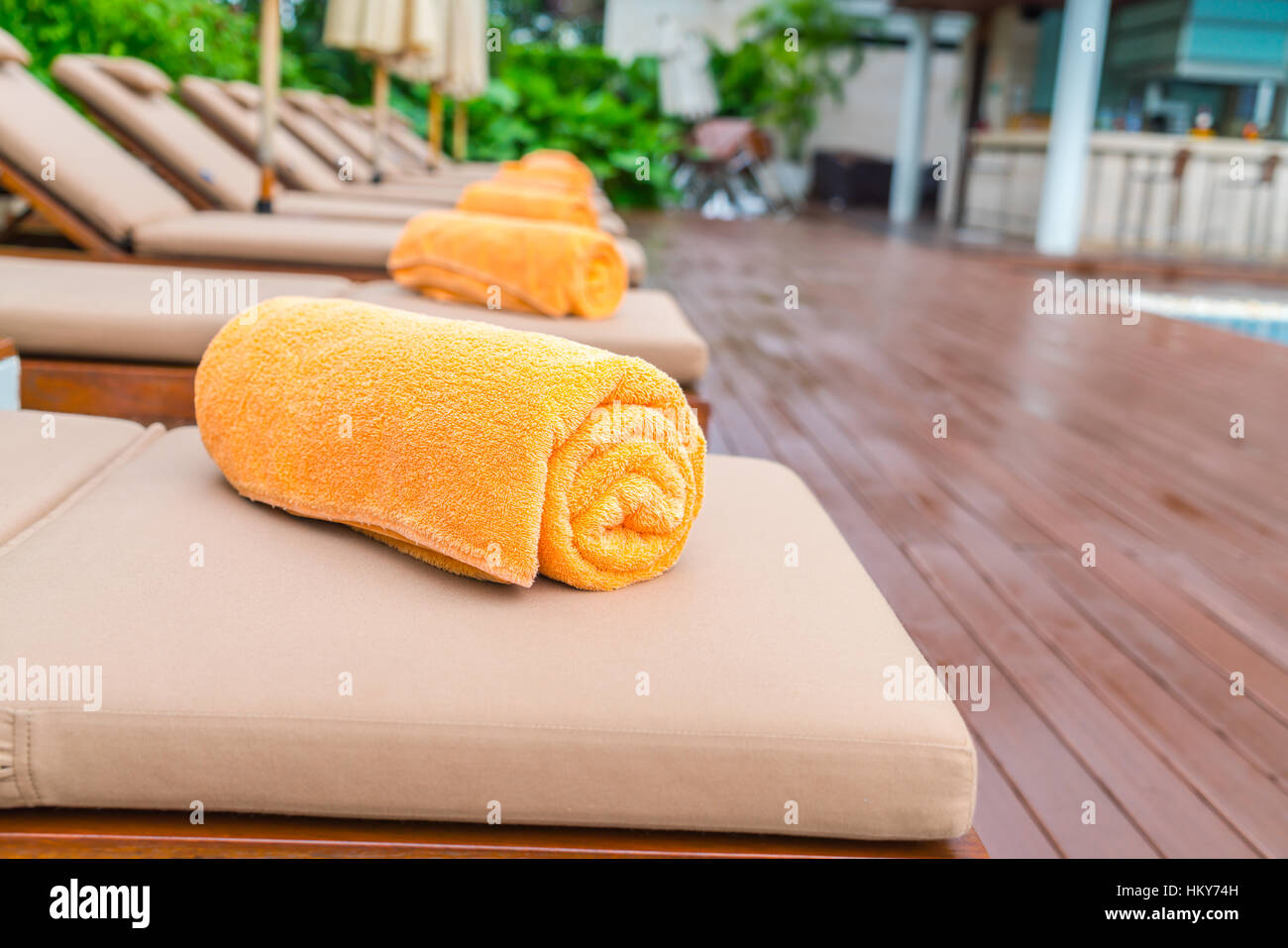 Swimming pool with relaxing seats Stock Photo - Alamy