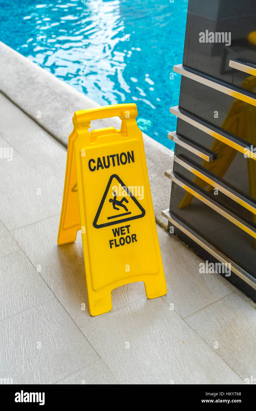 Warning sign at swimming pool Stock Photo - Alamy