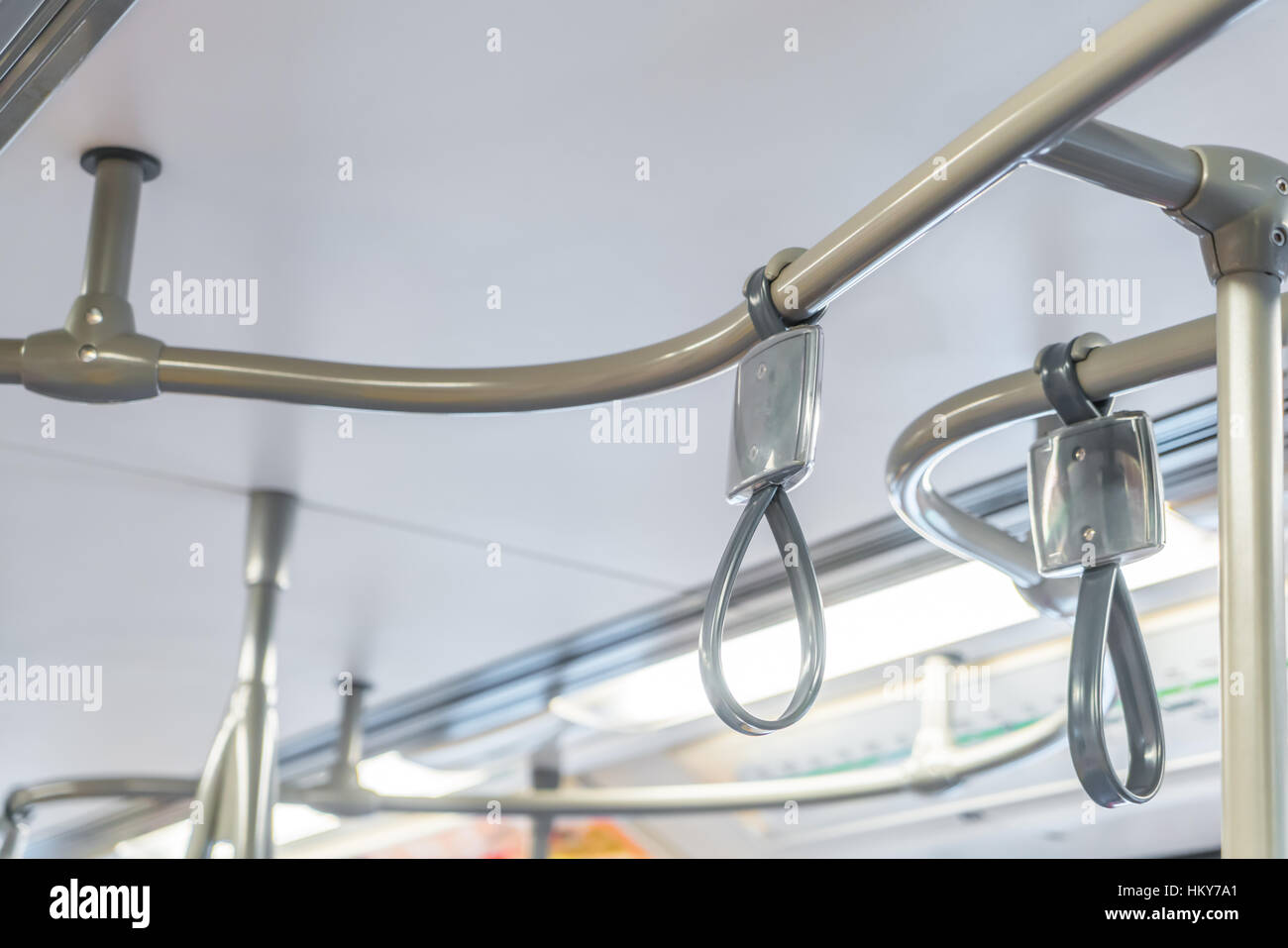 Handle loop in sky train Stock Photo - Alamy