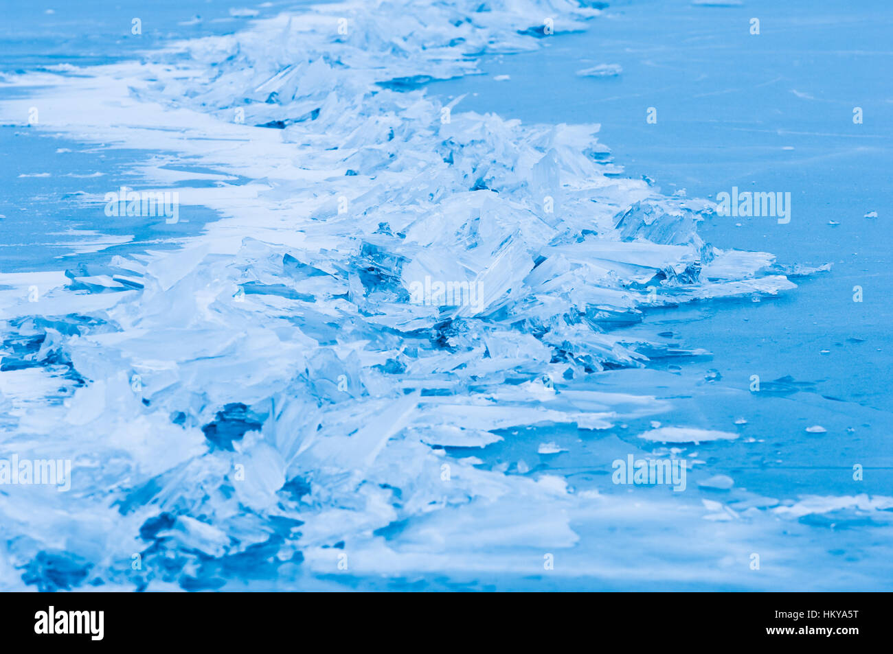 Winter scene at a frozen lake with ice-pack, ice float and other ice ...