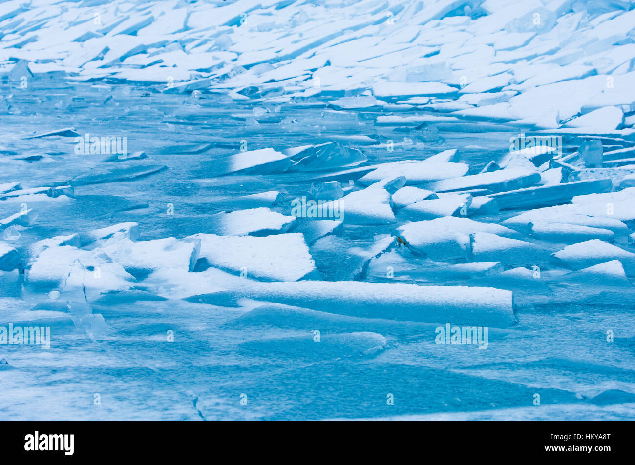 Winter scene at a frozen lake with ice-pack, ice float and other ice ...