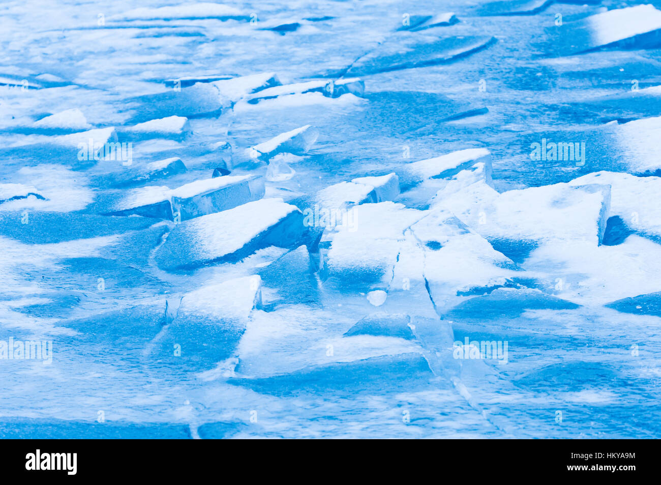 Winter scene at a frozen lake with ice-pack, ice float and other ice ...