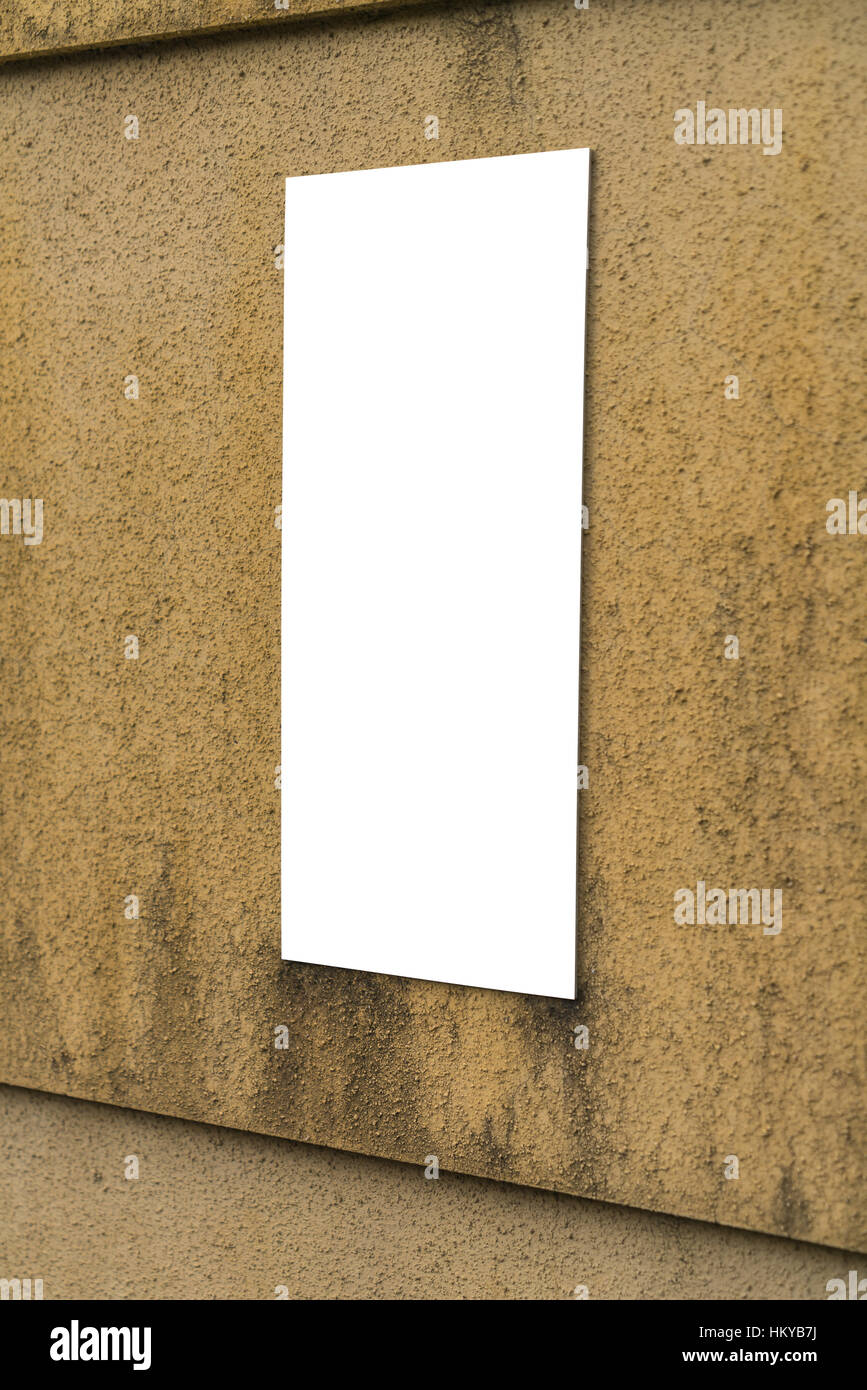 Blank sign on wall Stock Photo - Alamy