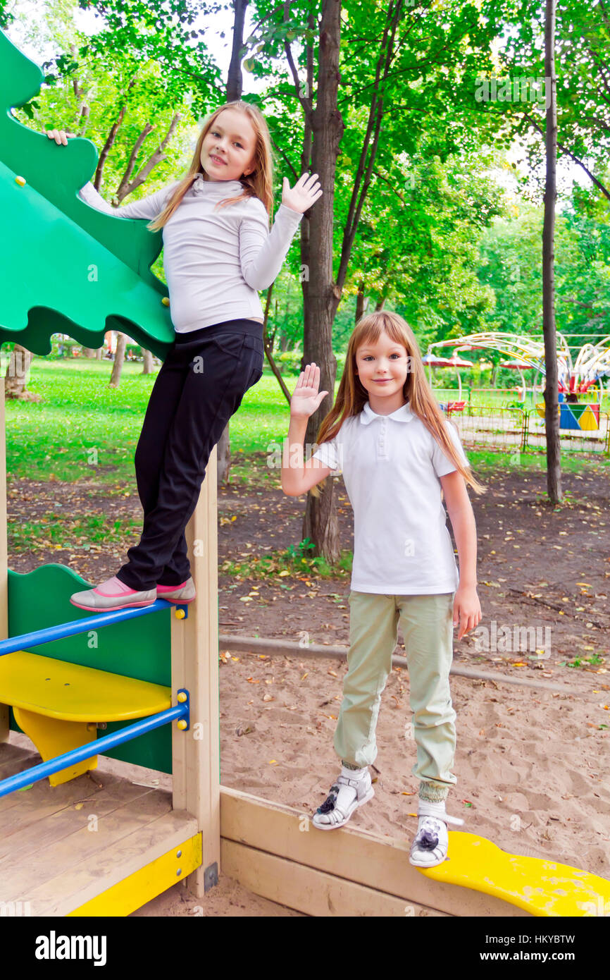 Photo of two playing girls in summer Stock Photo - Alamy