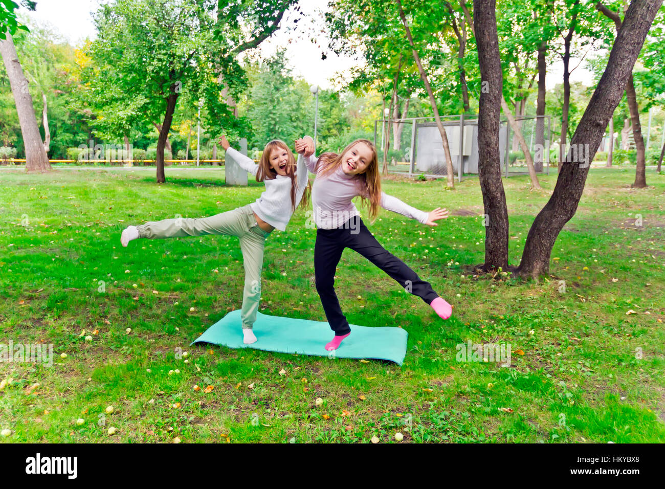 Photo of two playing girls in summer Stock Photo - Alamy