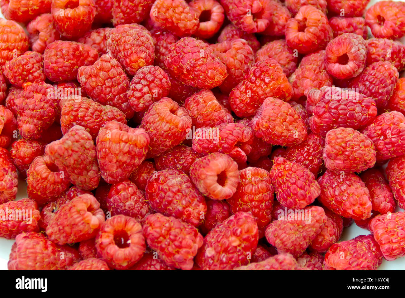Photo of the background fresh red raspberry Stock Photo - Alamy