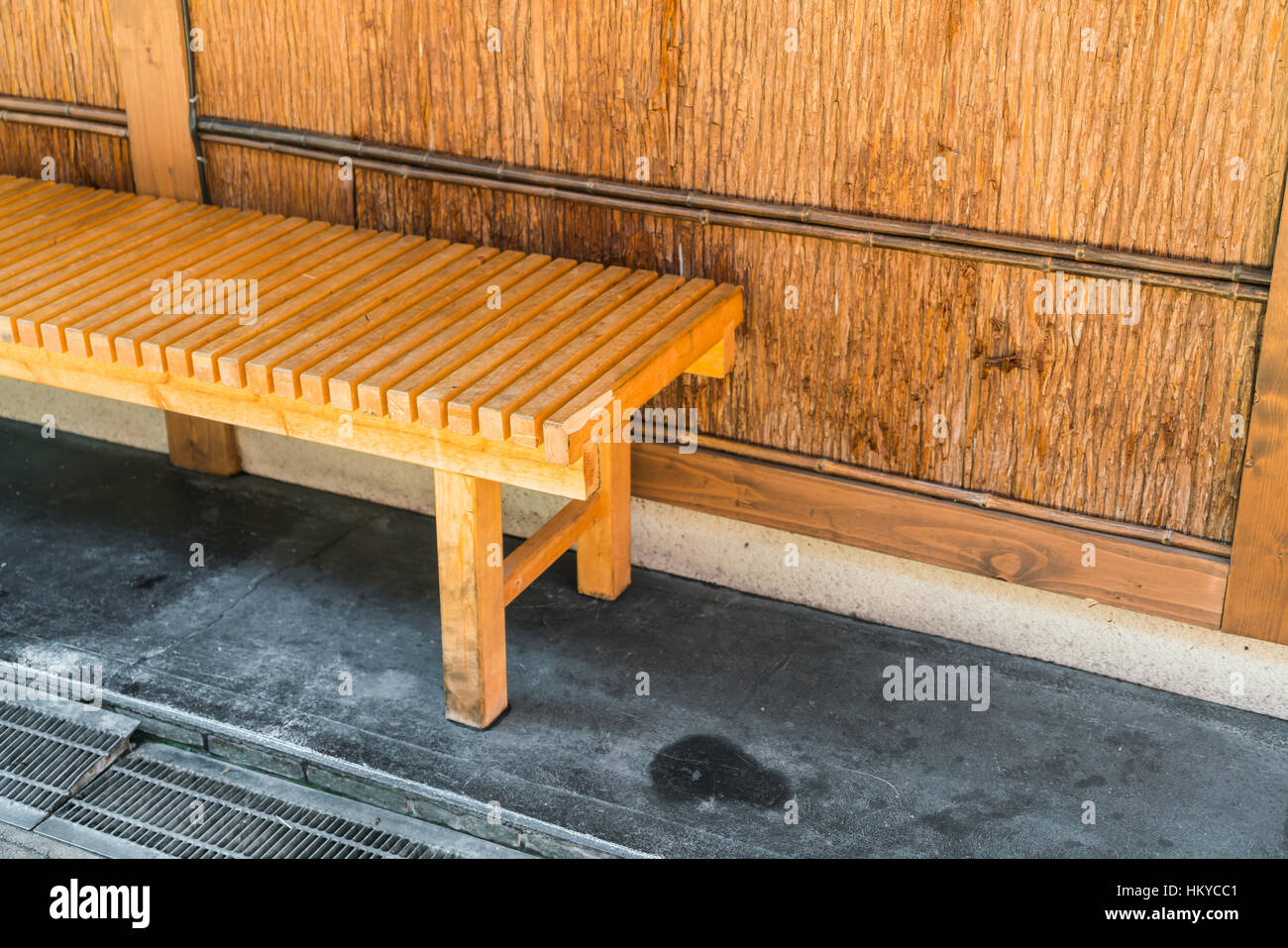 Wood Bench Against wood Wall Stock Photo - Alamy