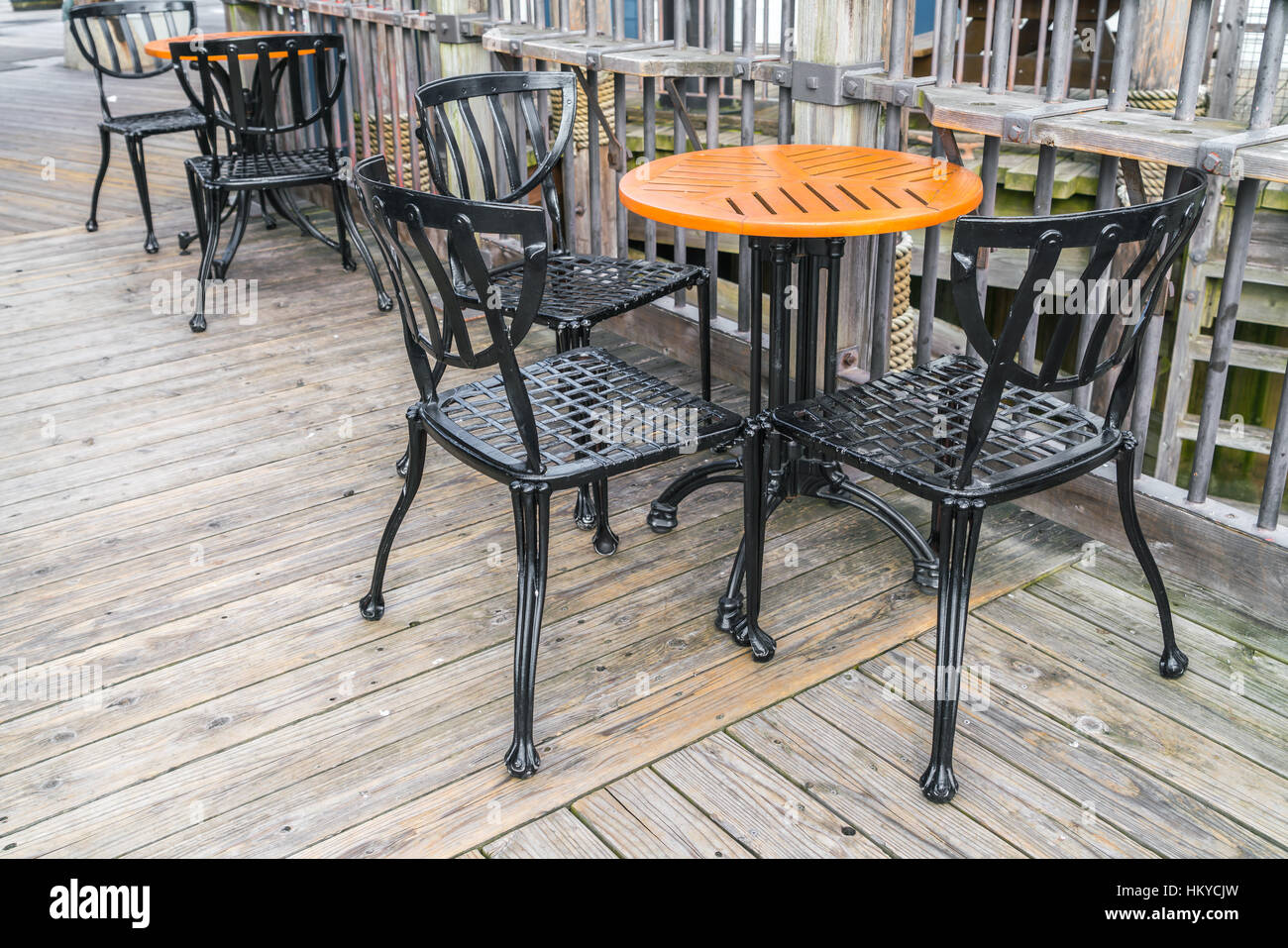 Tables and chairs in restaurant Stock Photo - Alamy