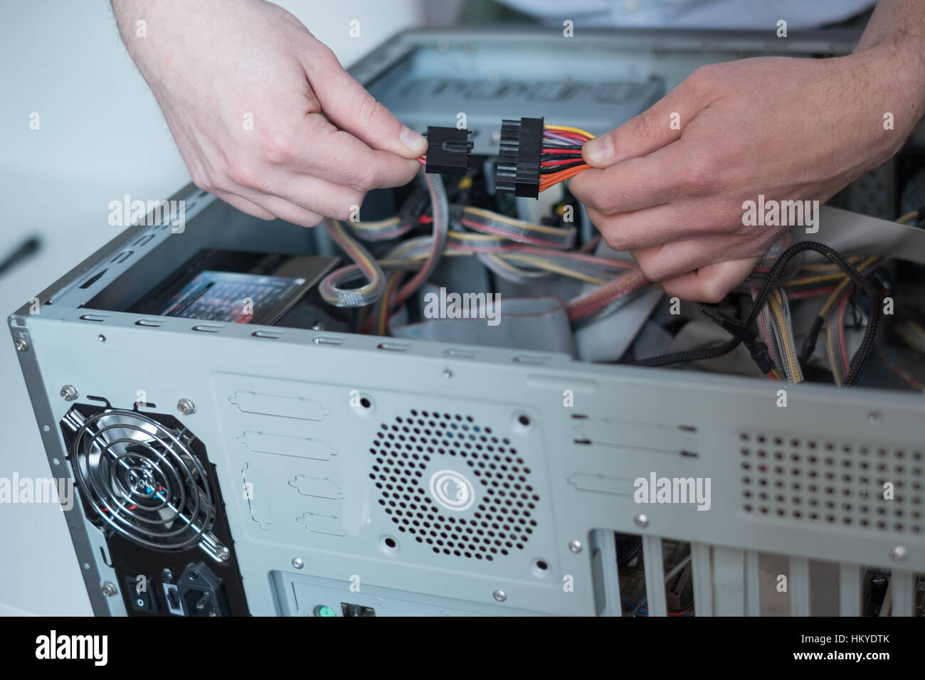 Professional man repairing and assembling a computer Stock Photo - Alamy