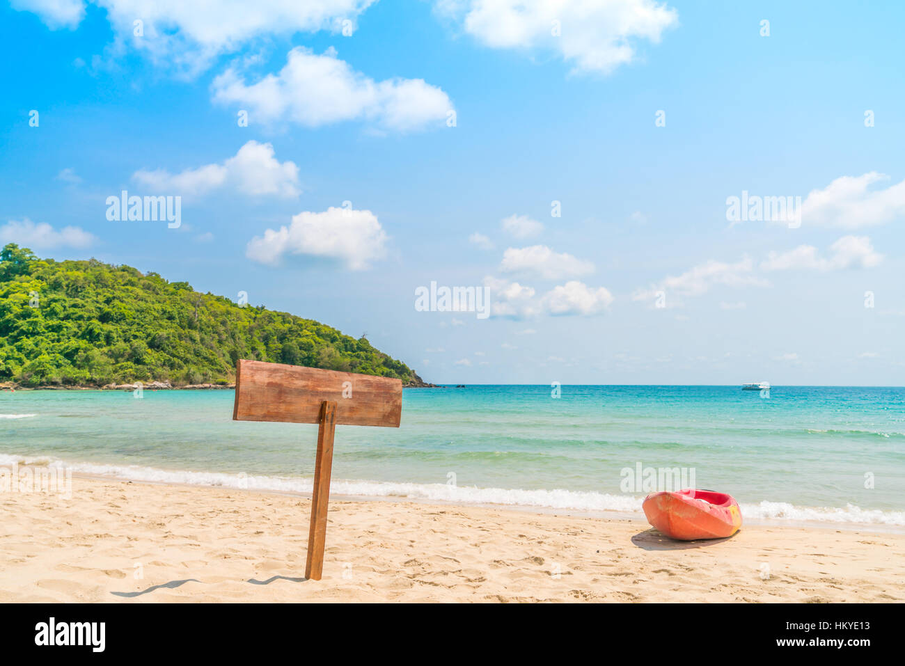 Wooden signboard on tropical beach Stock Photo - Alamy