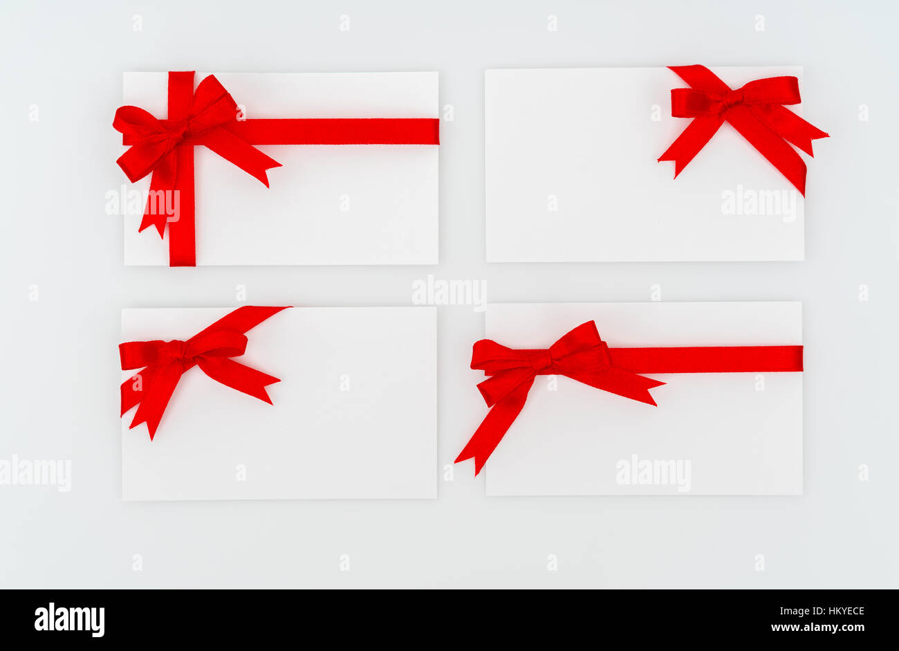 Card with red ribbons bows Stock Photo - Alamy